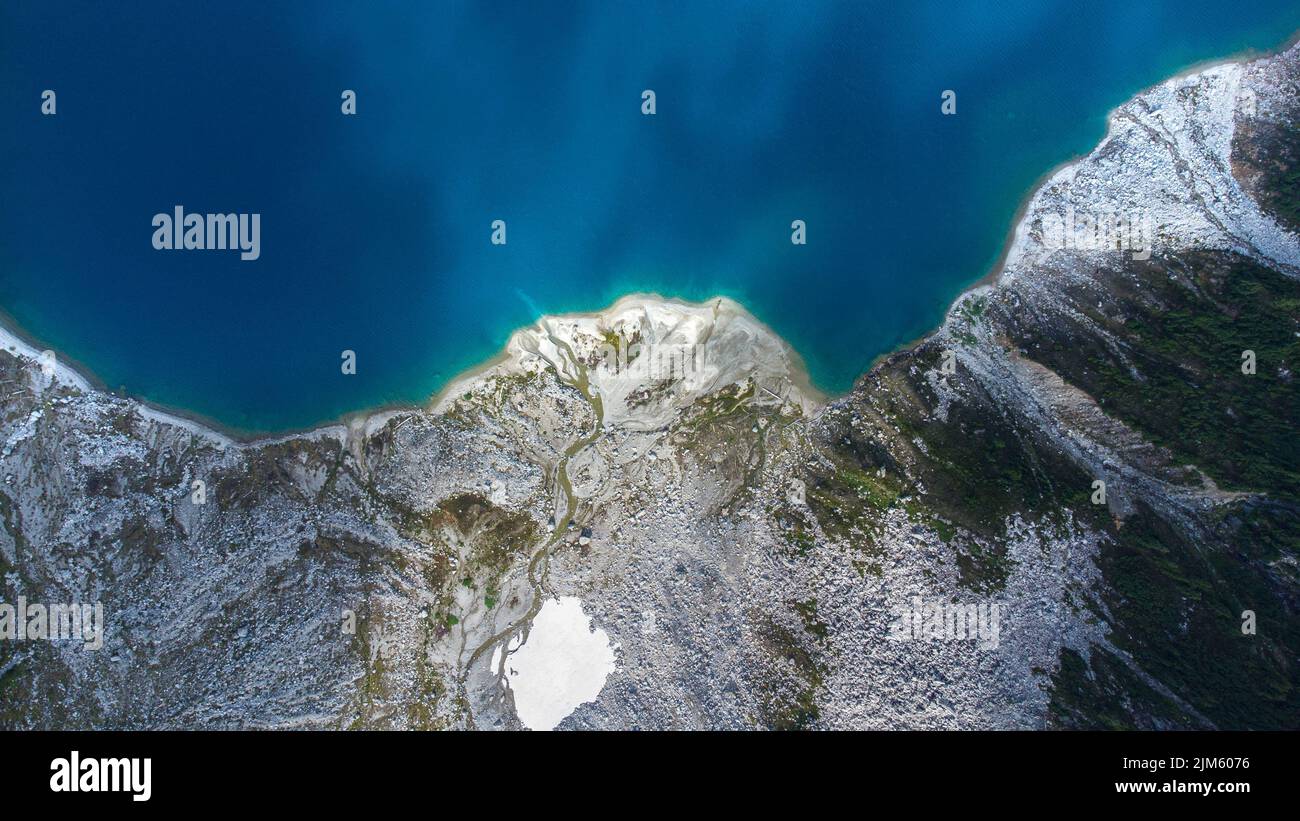 An aerial top view of a calm lake Stock Photo - Alamy