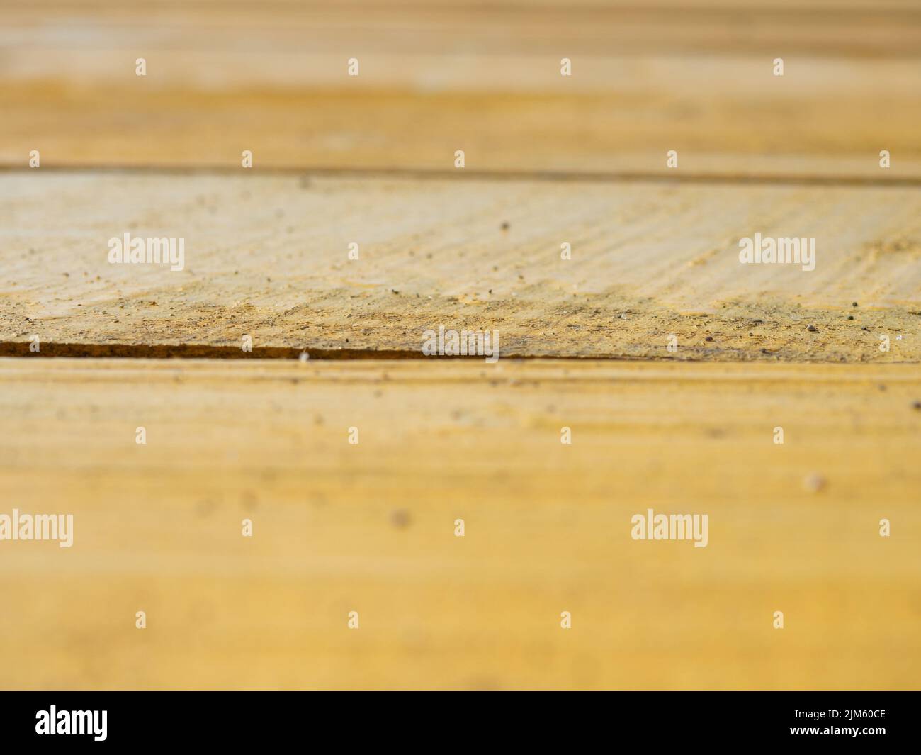 Knocked down fresh boards. Construction works. Plank floor. Fresh wood ...