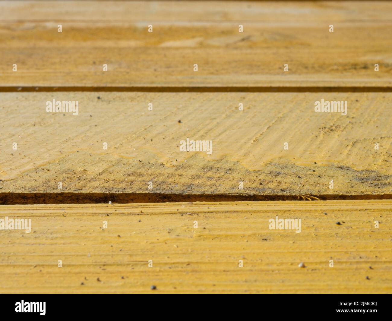 Knocked down fresh boards. Construction works. Plank floor. Fresh wood ...