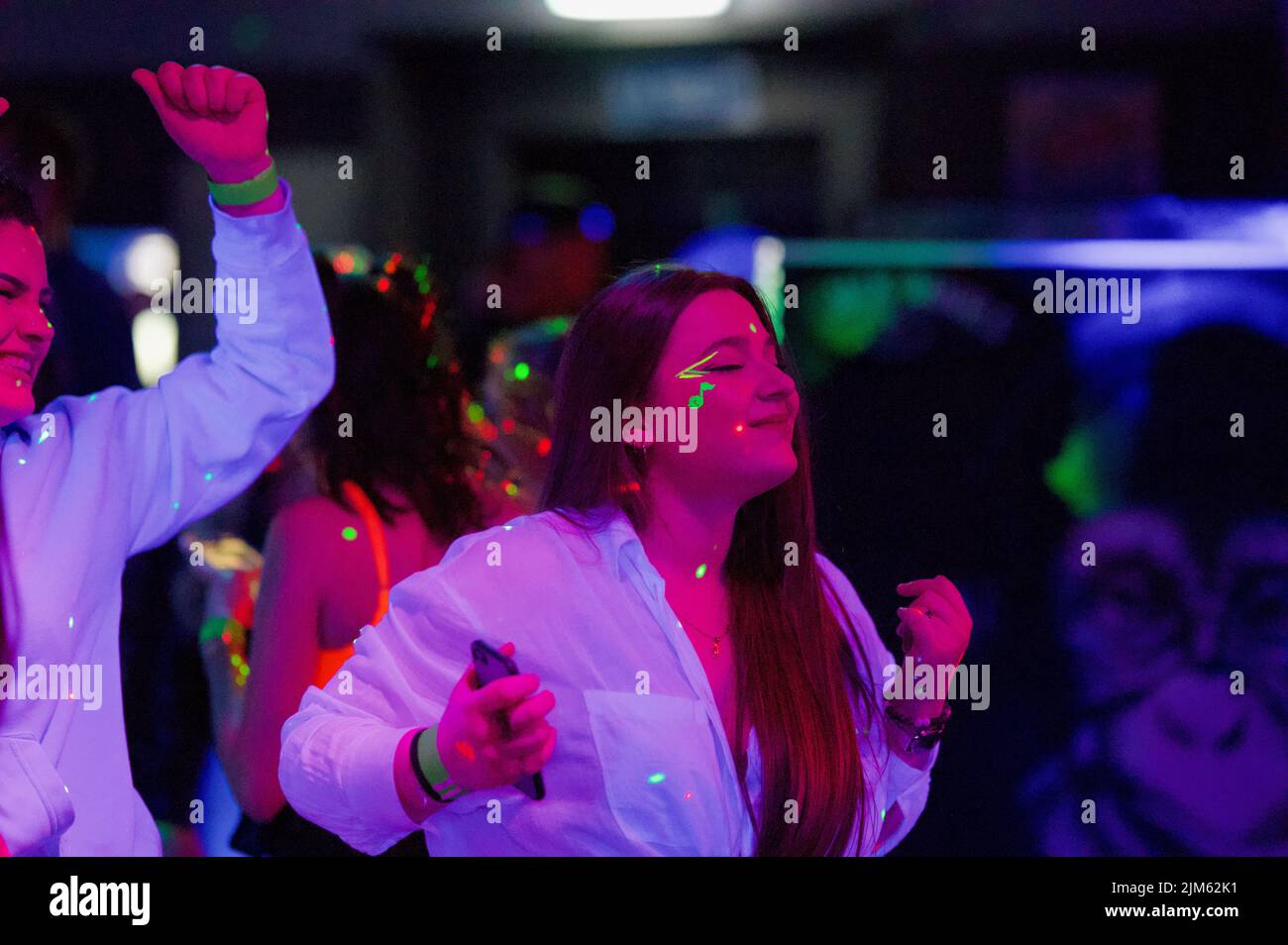 The people partying at a night club in Kamplintfo, Germany Stock Photo ...