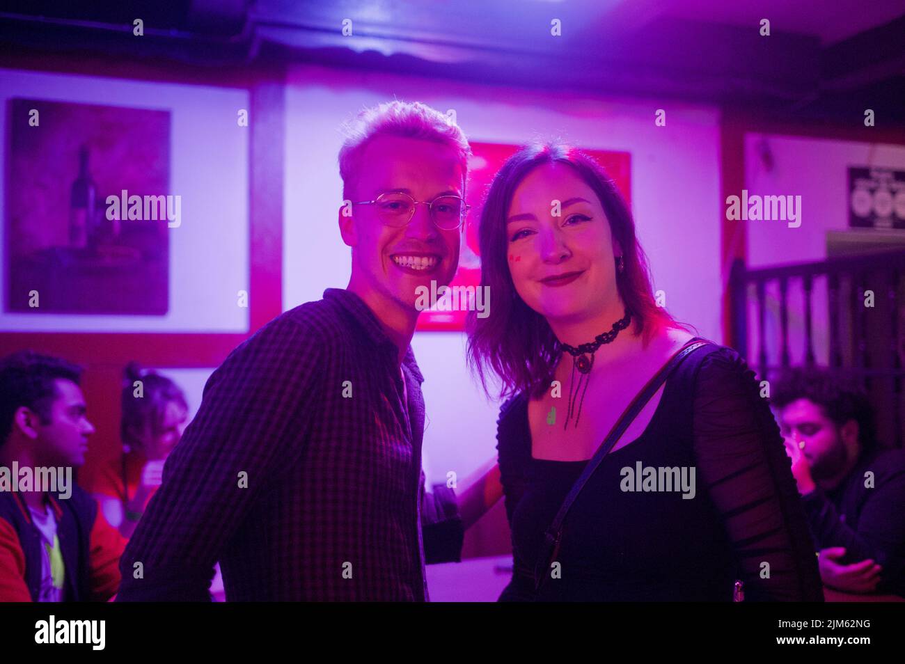 A couple posing in a night club Stock Photo - Alamy