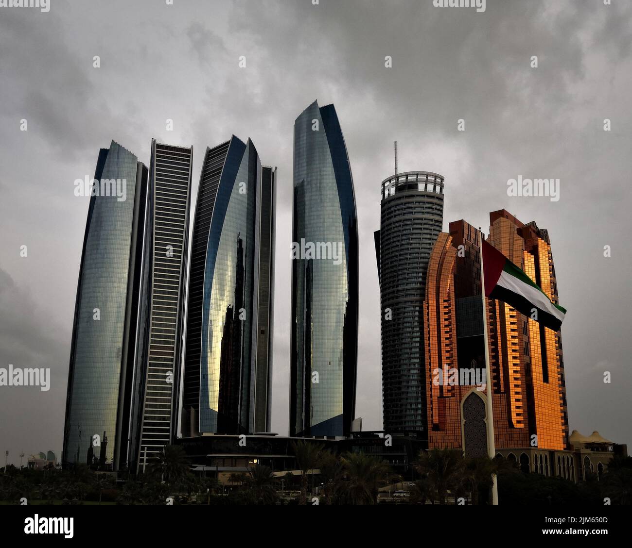 Skyscrapers in downtown Abu Dhabi on a cloudy da Stock Photo - Alamy
