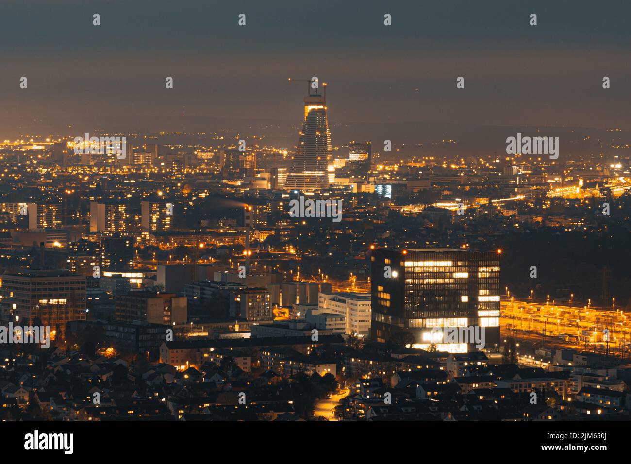 A mesmerizing night horizon of a large modern city at night Stock Photo ...