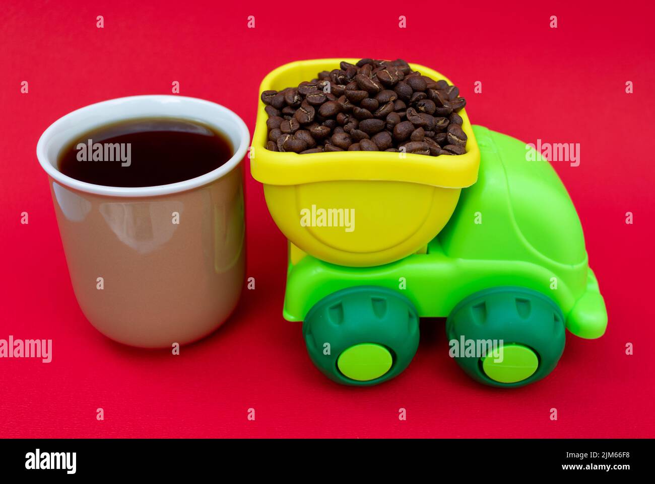 Truck transporting coffee beans and a cup of coffee. Coffee concept ...