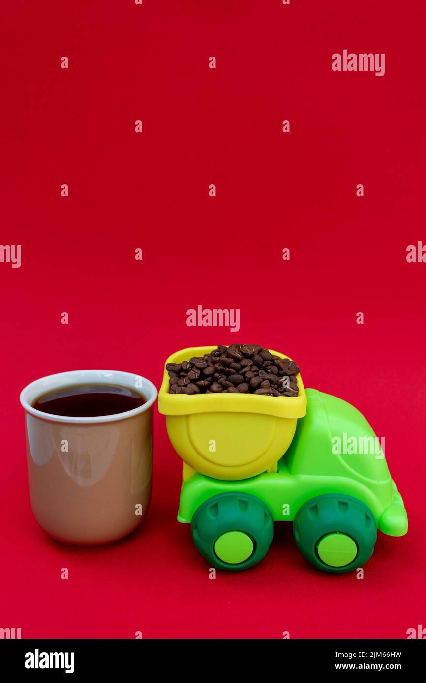 Truck transporting coffee beans and a cup of coffee. Coffee concept ...