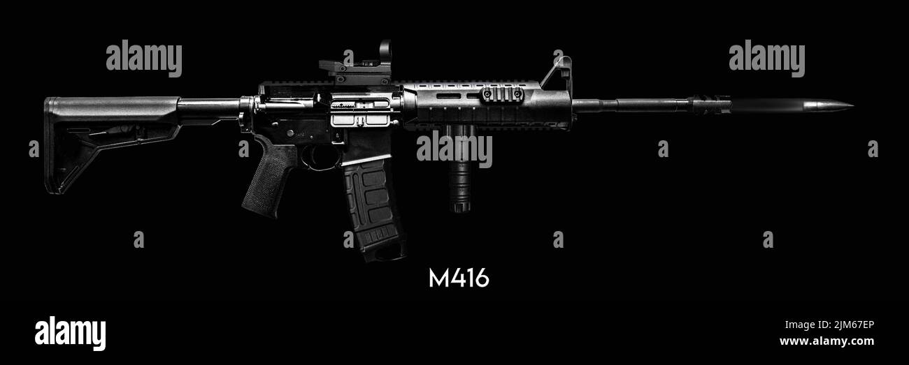 A panoramic closeup of the black rifle isolated on dark background ...