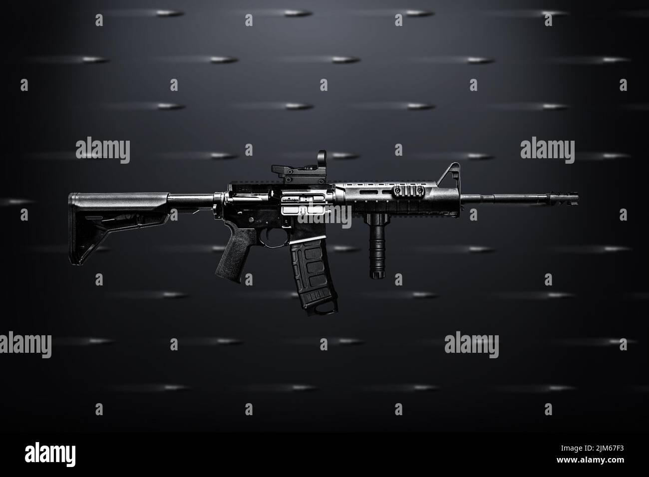 The black rifle with bullets isolated on dark background Stock Photo ...