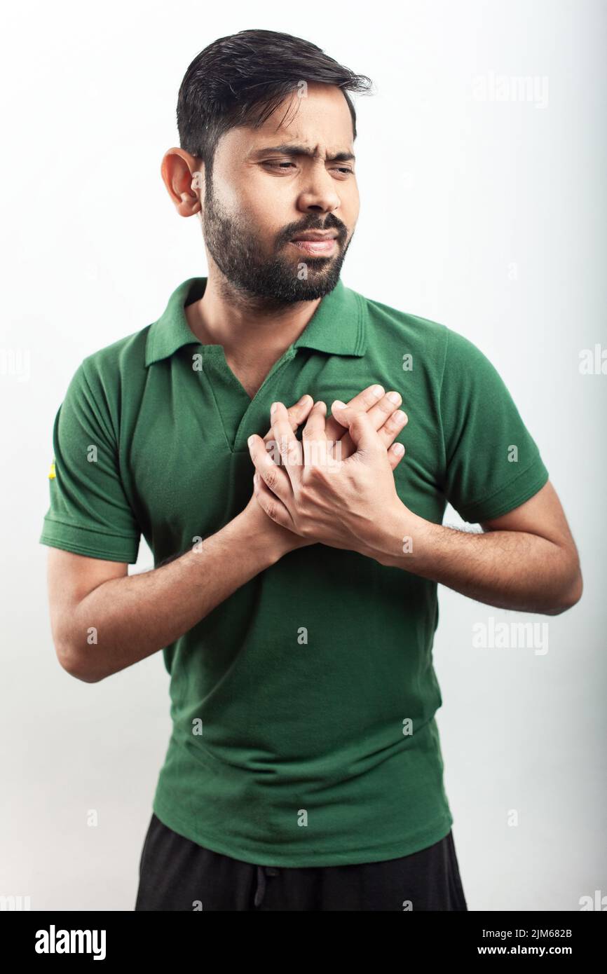 Heart attack clutching chest hi-res stock photography and images - Alamy