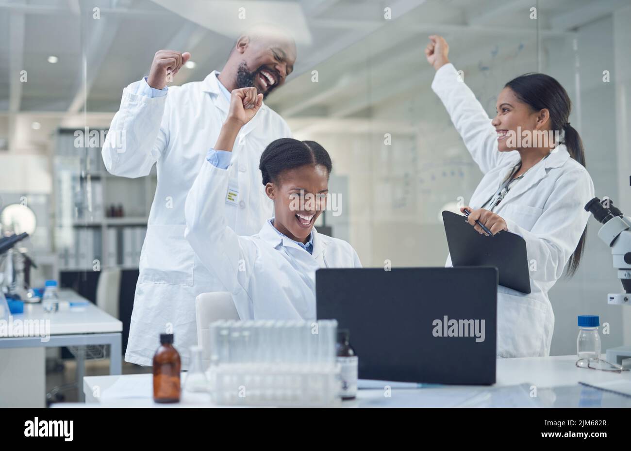 Group happy scientists celebrating hi-res stock photography and images ...