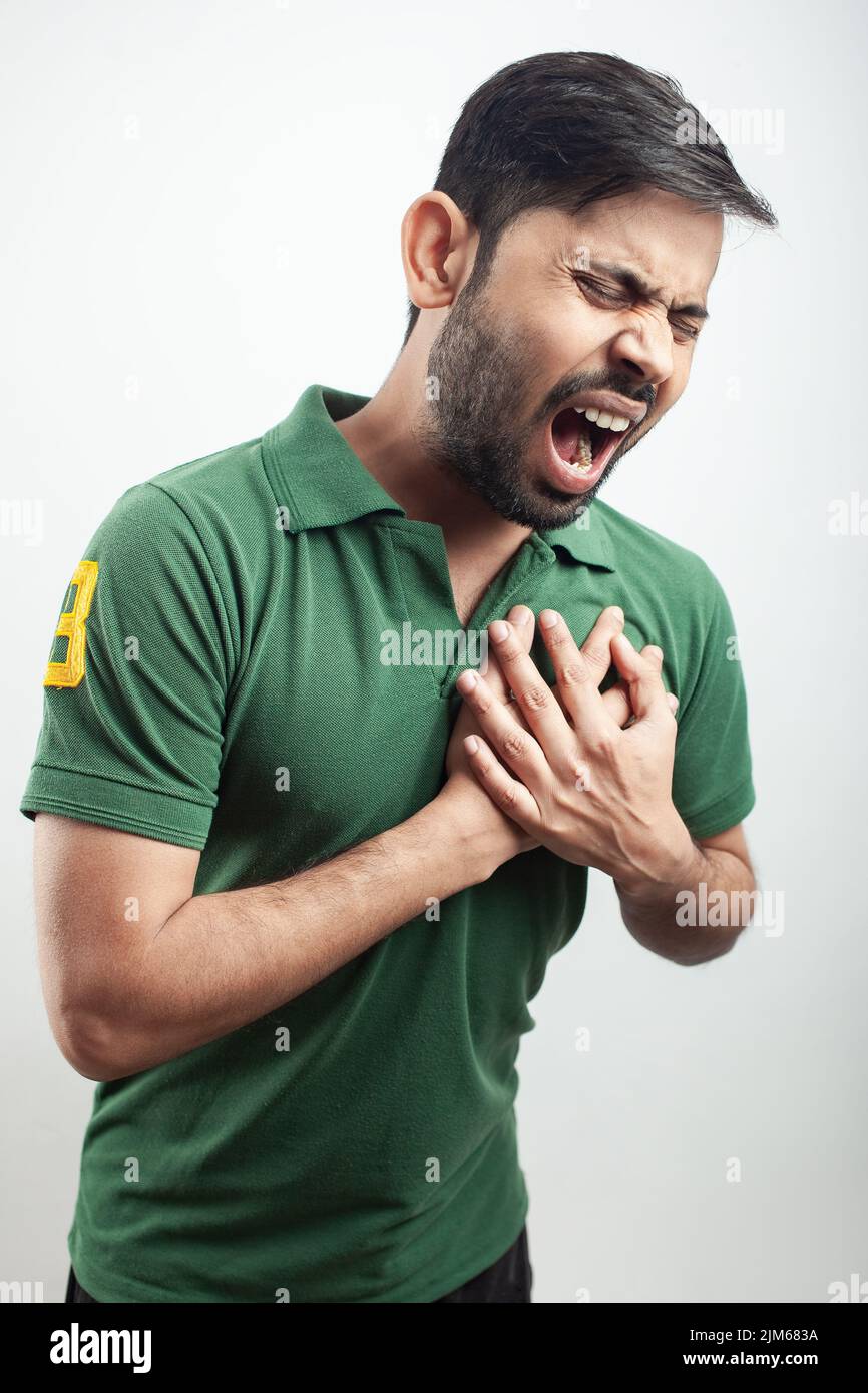 Chest pain, heartache, heart attack. Man with shouting expression ...
