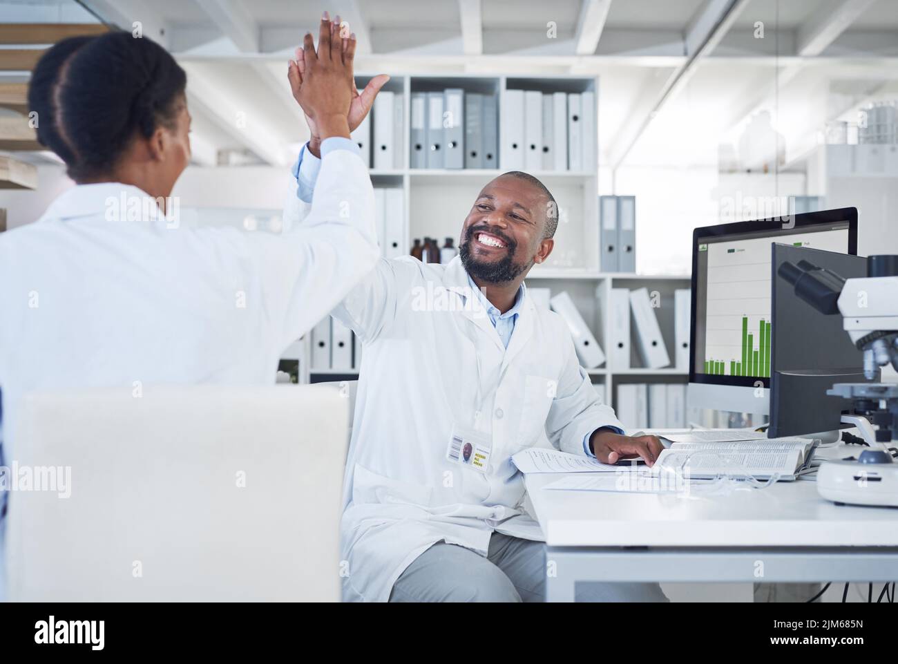 I scream, you scream, we all scream for science. two scientists giving ...