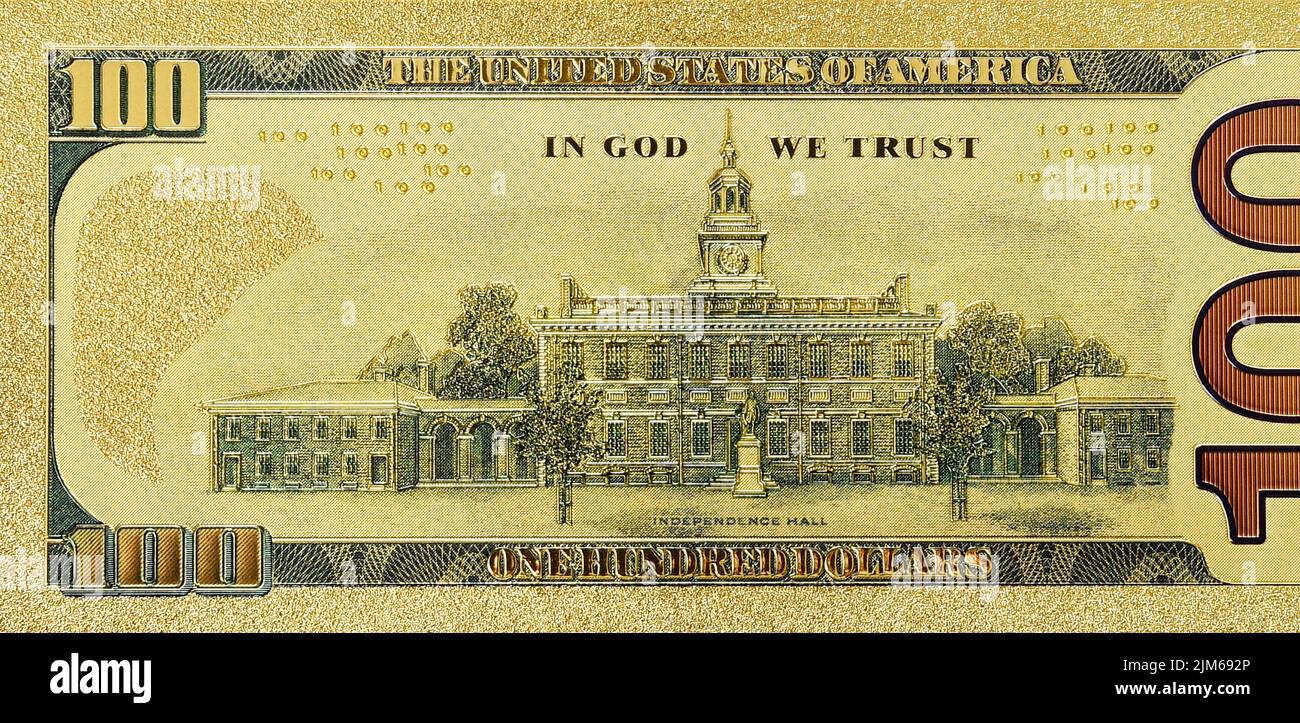 The opposite side of a gold 100 dollar bill for collections Stock Photo ...