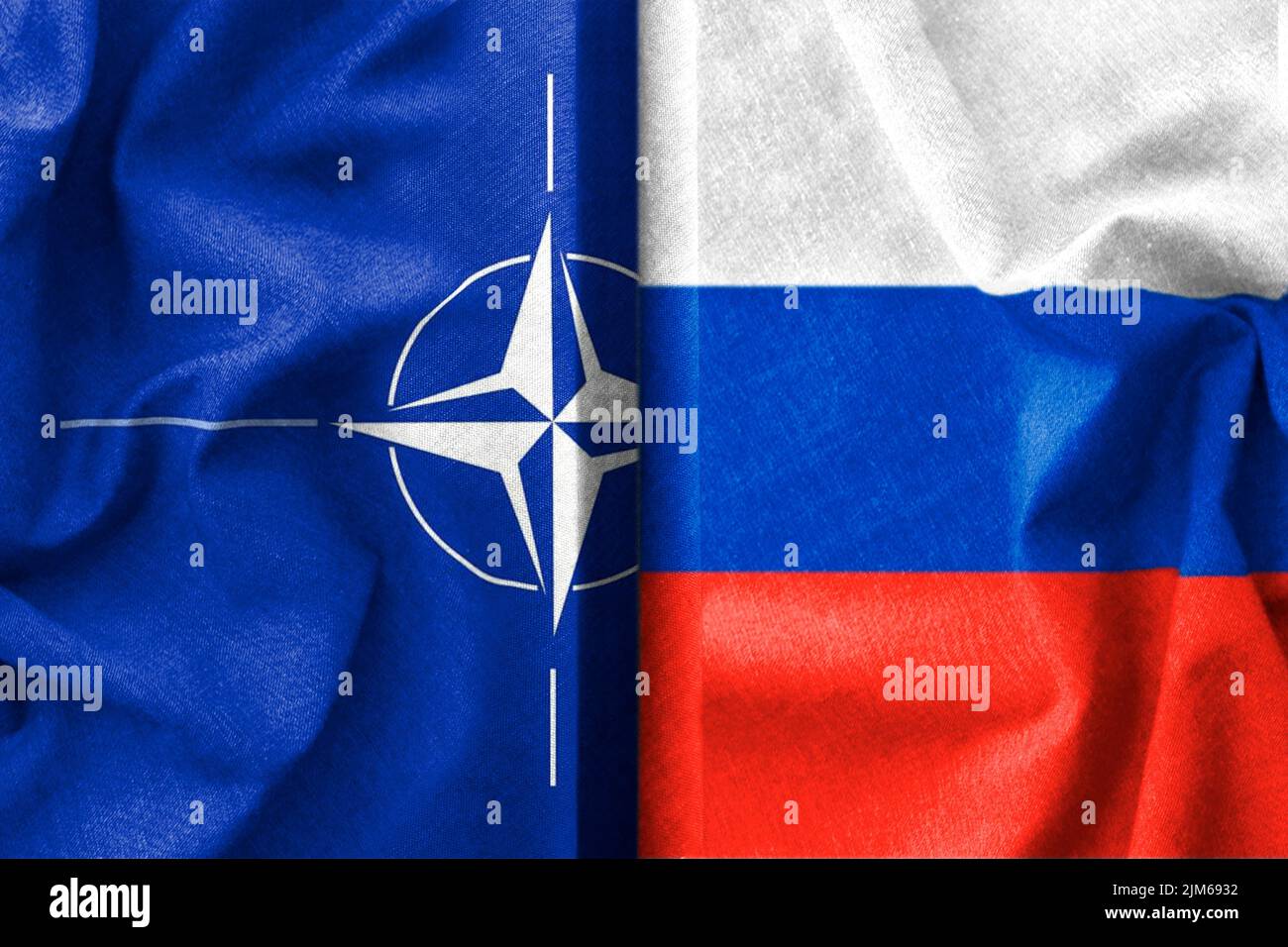 A split illustration of NATO and Russia flags depicting the conflict ...