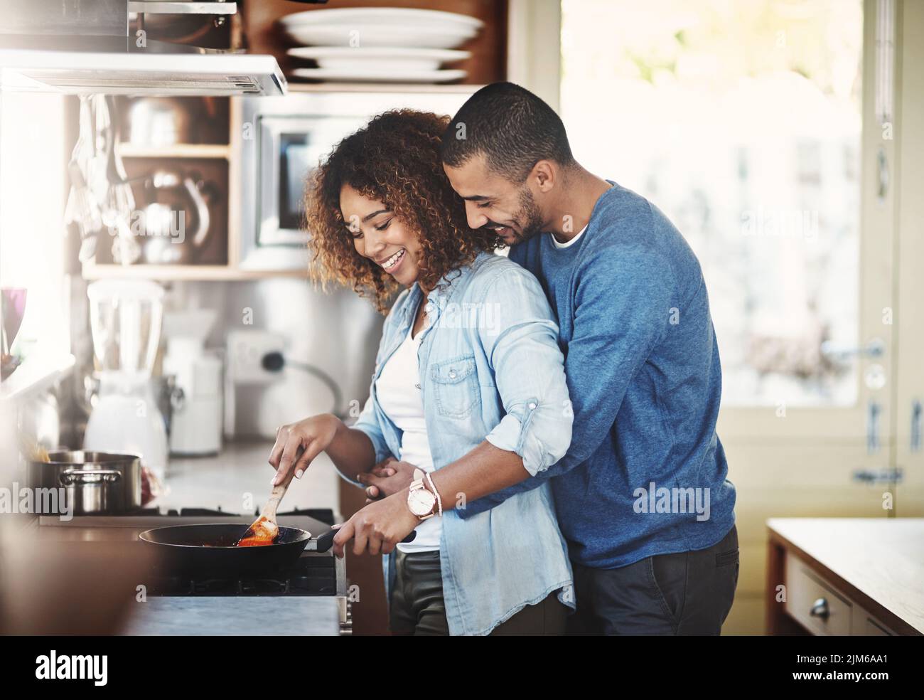 Lovers cooking together in kitchen hi-res stock photography and images ...