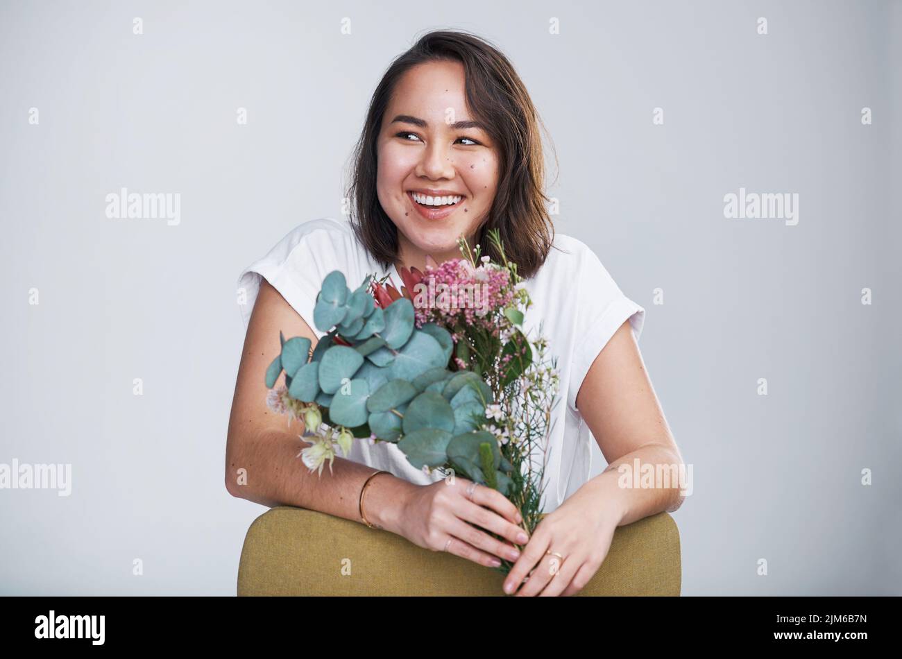 Make her day by sending her flowers. a beautiful young woman posing ...