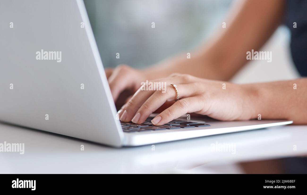 Sending status updates to clients via email. Closeup shot fo an ...