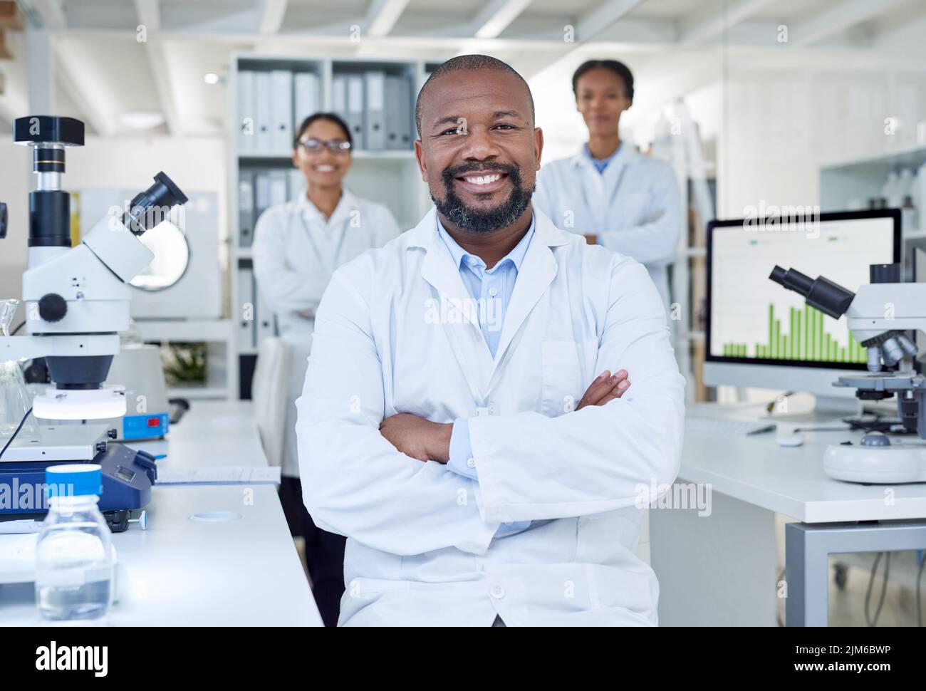 Science changes the world in big ways. Portrait of a group of ...