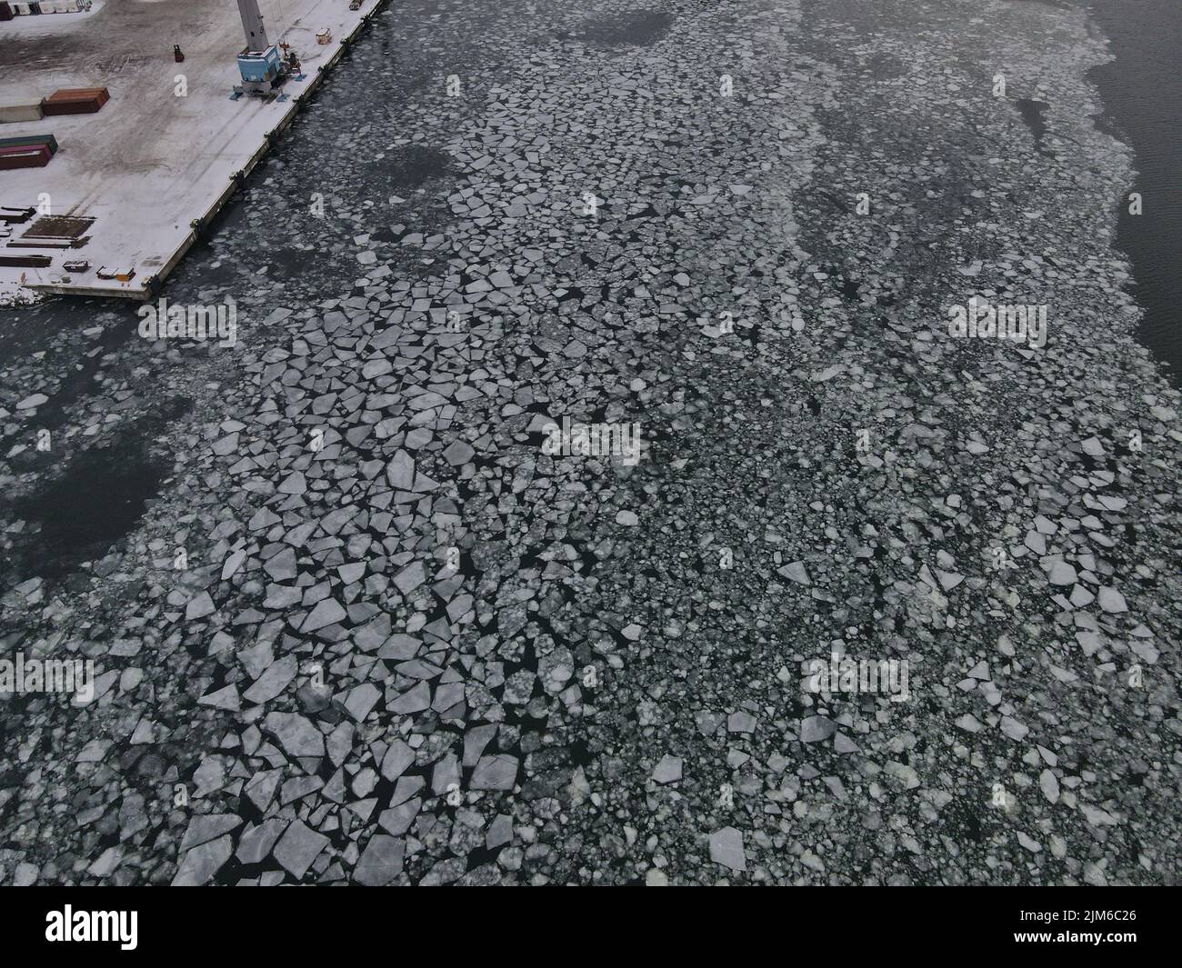 An aerial view of ice pieces in the lake Stock Photo - Alamy