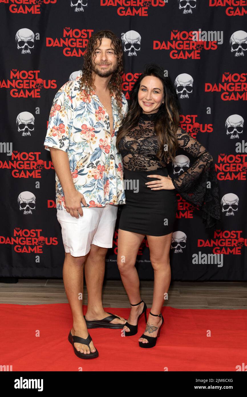 COCONUT GROVE, FL - AUGUST 4: Eddie Pollard and Elissa Dowling attend ...