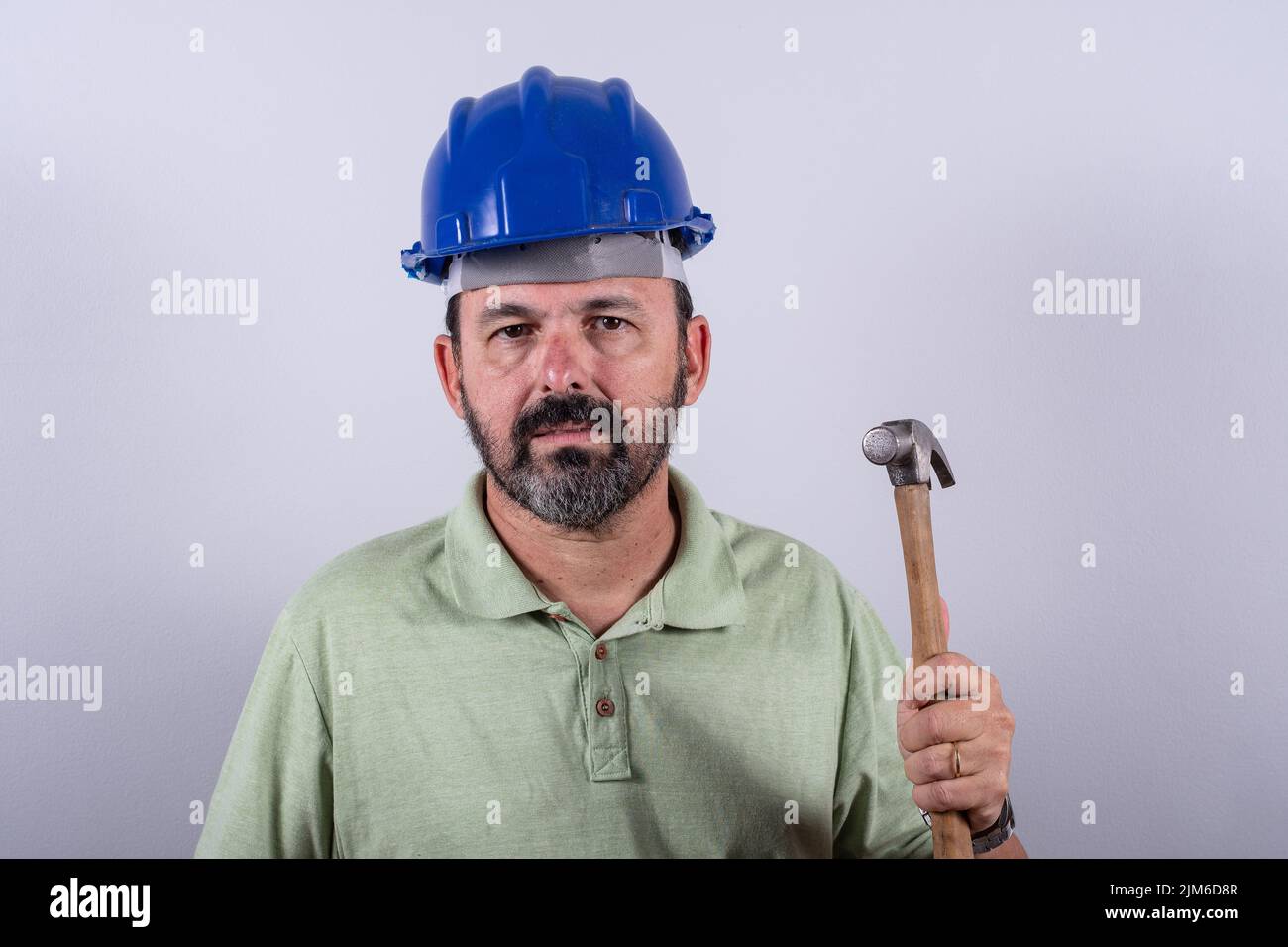 Portrait of 60 years old professional heavy industry engineer/worker ...