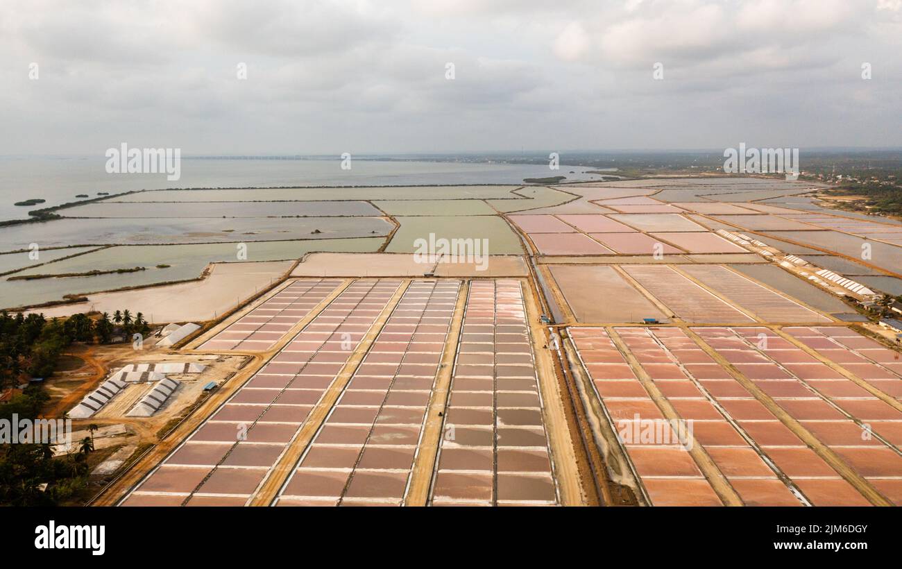 Aerial drone of Salt fields of the plantation and pools with sea water ...