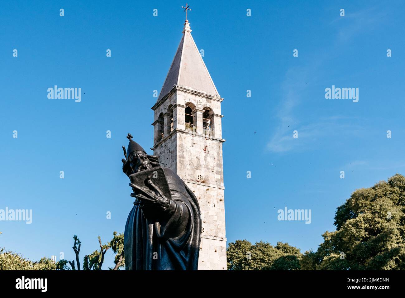 The famous statue of Saint Gregory of Nin and the St. Arnir church bell ...