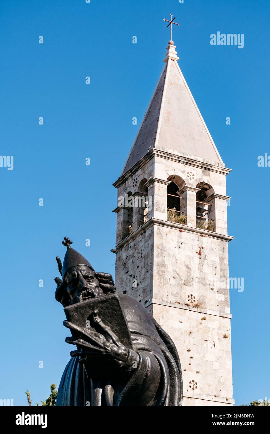 The famous statue of Saint Gregory of Nin and the St. Arnir church bell ...
