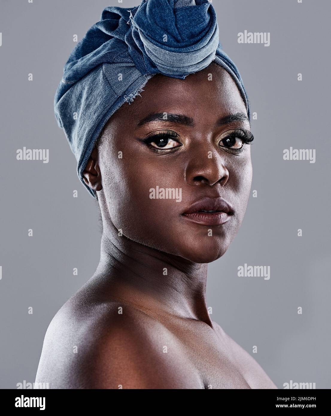 Showing off nothing but her beautiful face. a beautiful young woman ...