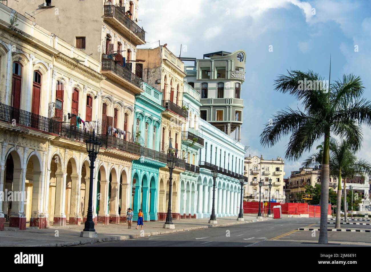 A row of colorful building across the street from Cuba's famous Capital ...