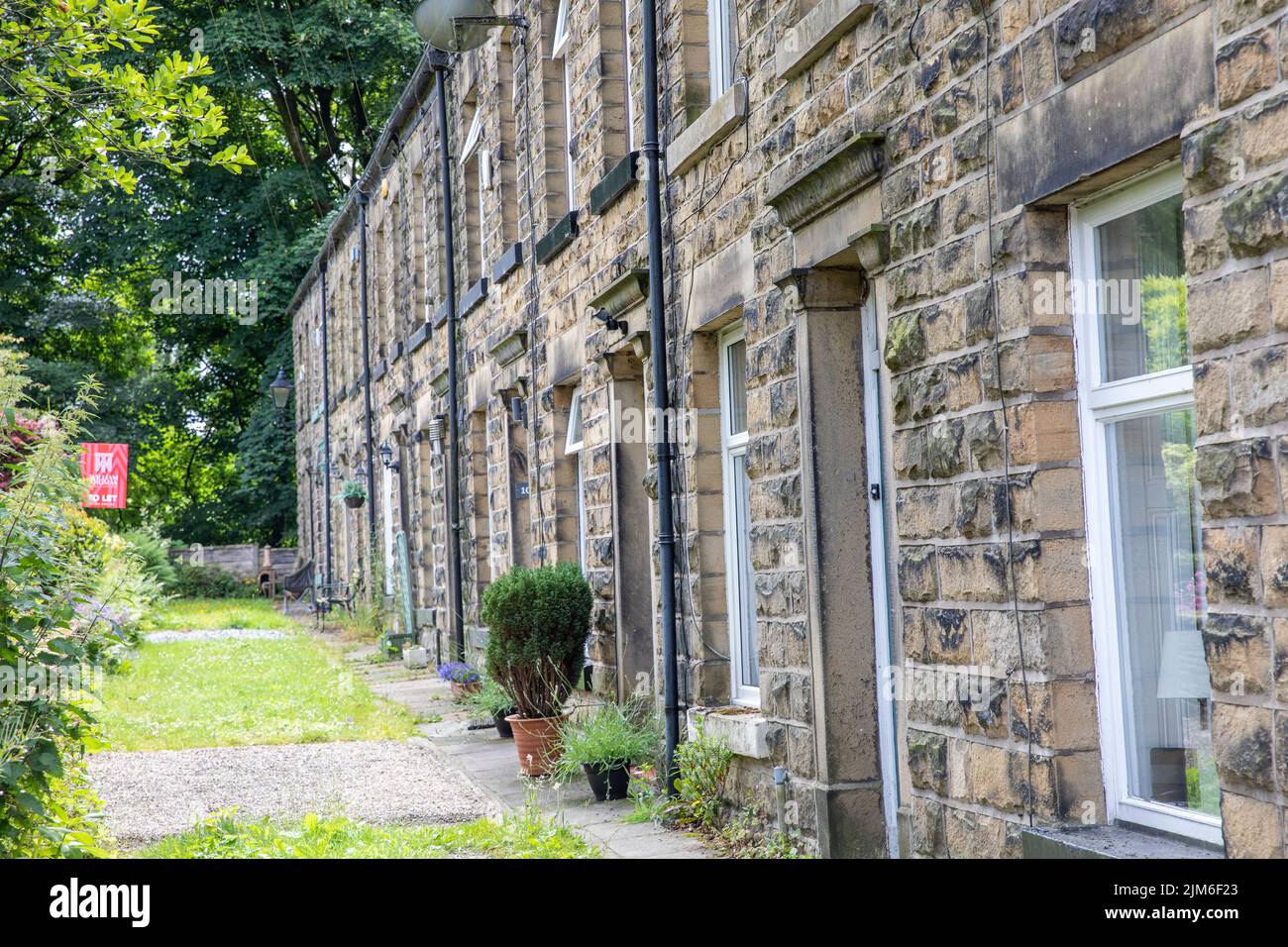 Edgworth village in county of Lancashire, street of narrow stone ...