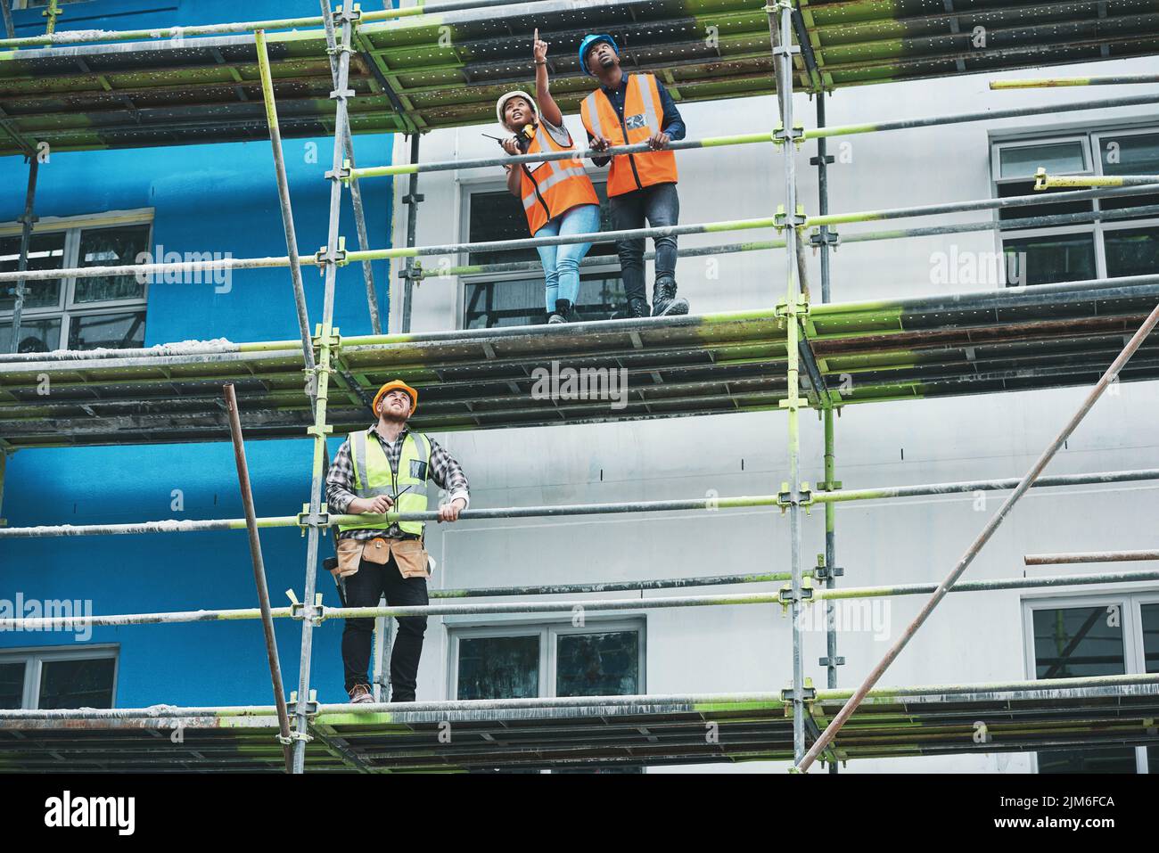 Coordinating staff and resources to deliver on proposed plans. a group ...