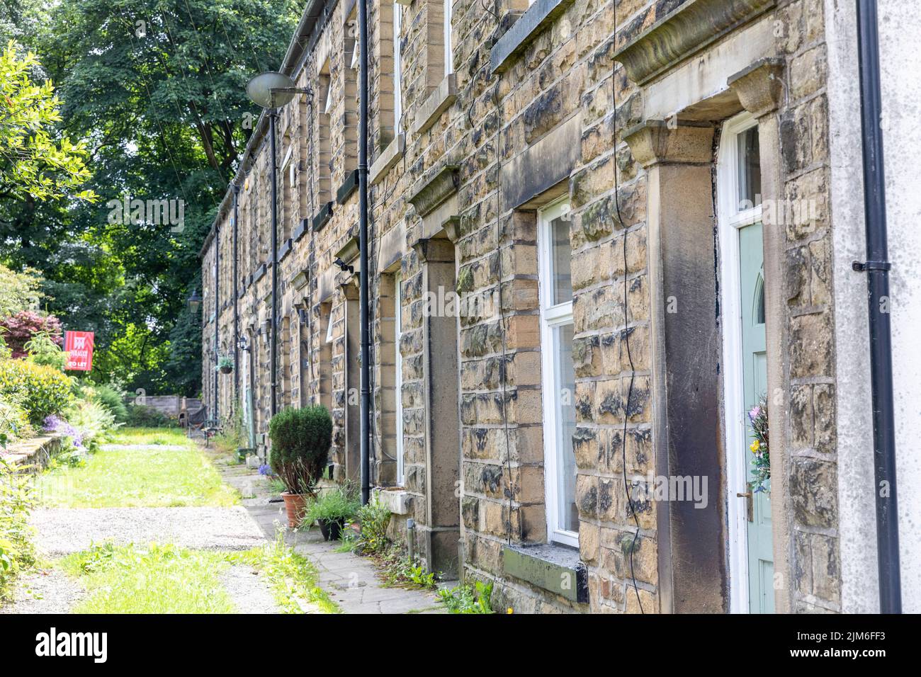 Edgworth village in county of Lancashire, street of narrow stone ...