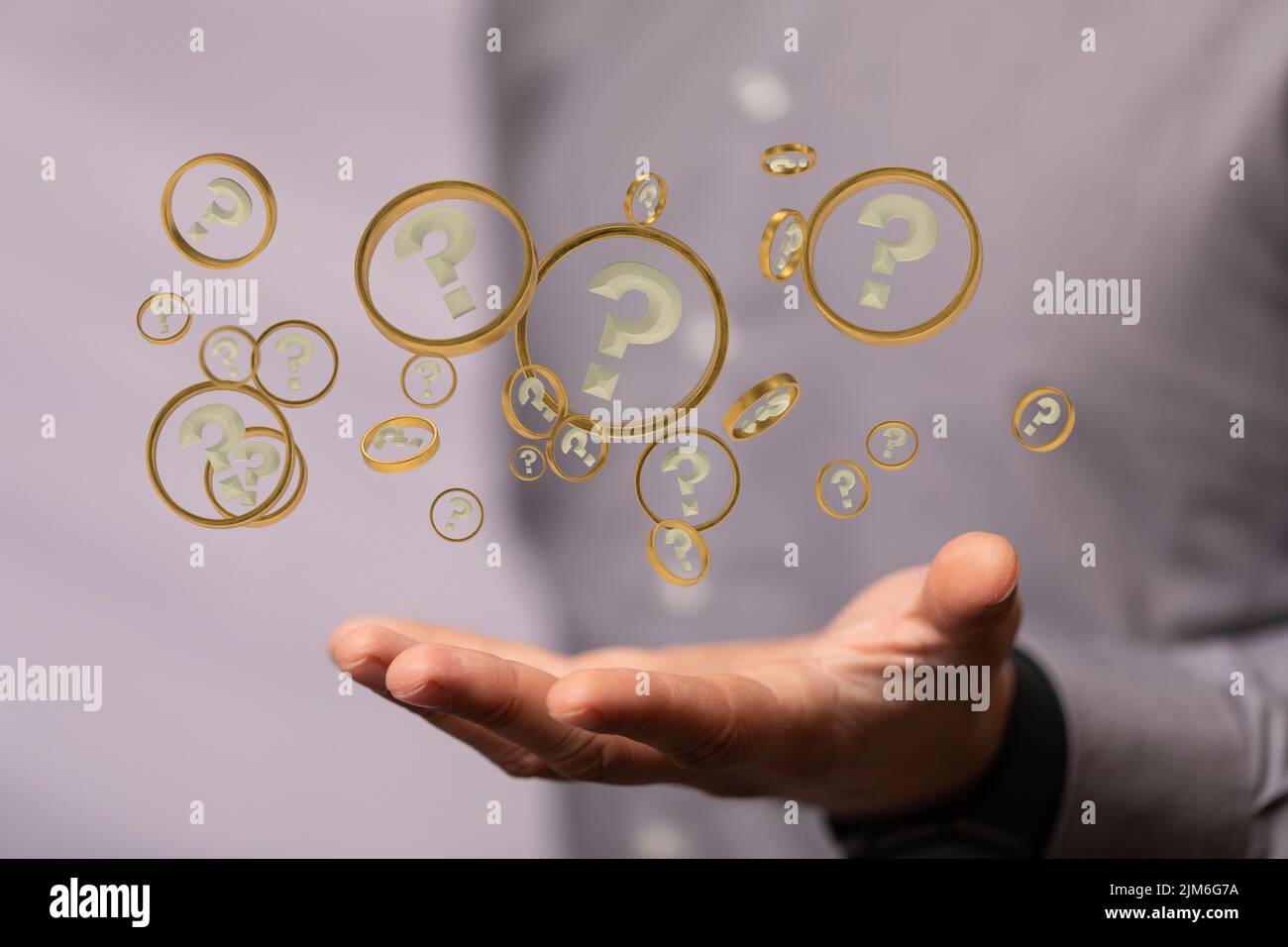 A hologram of a 3D rendered question marks with a person's hand below ...