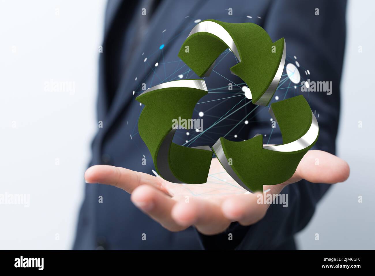A closeup shot of a man showing the recycling symbol Stock Photo - Alamy