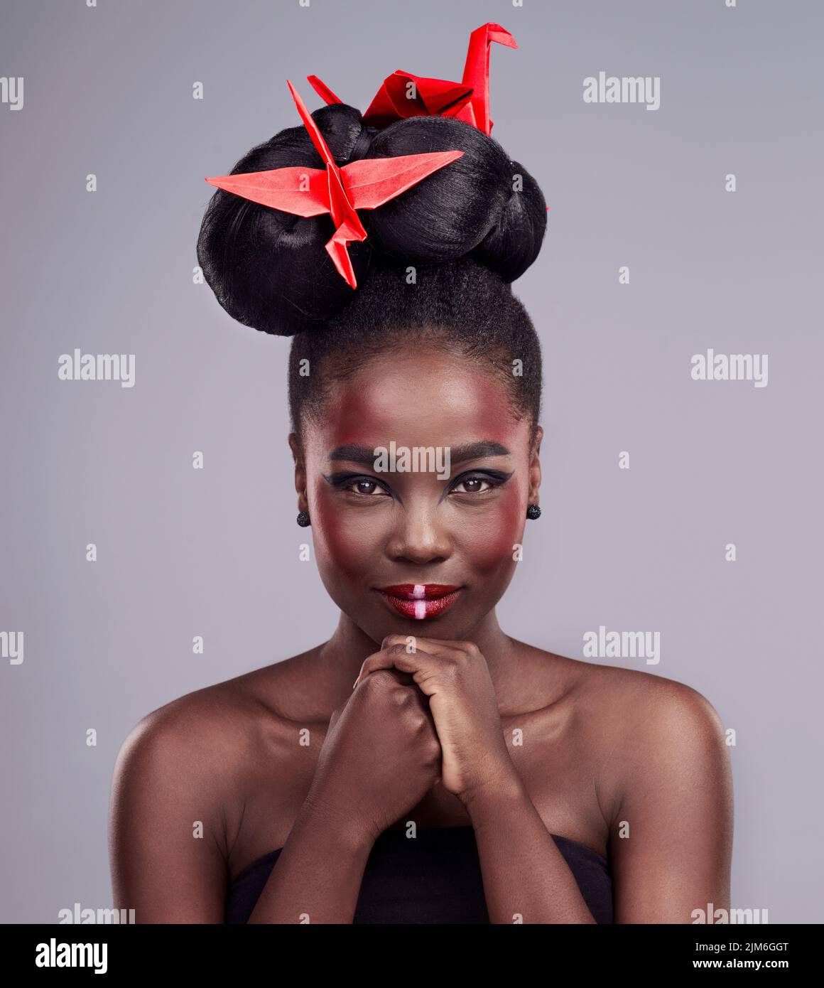 I love the confidence makeup gives me. Studio portrait of a beautiful ...