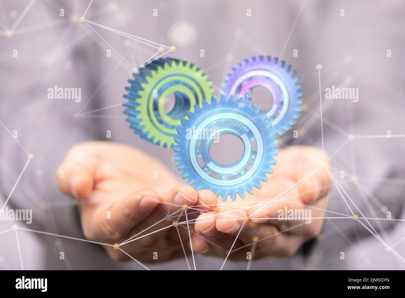 A 3D render of mechanical gears being manipulated in a holographic ...