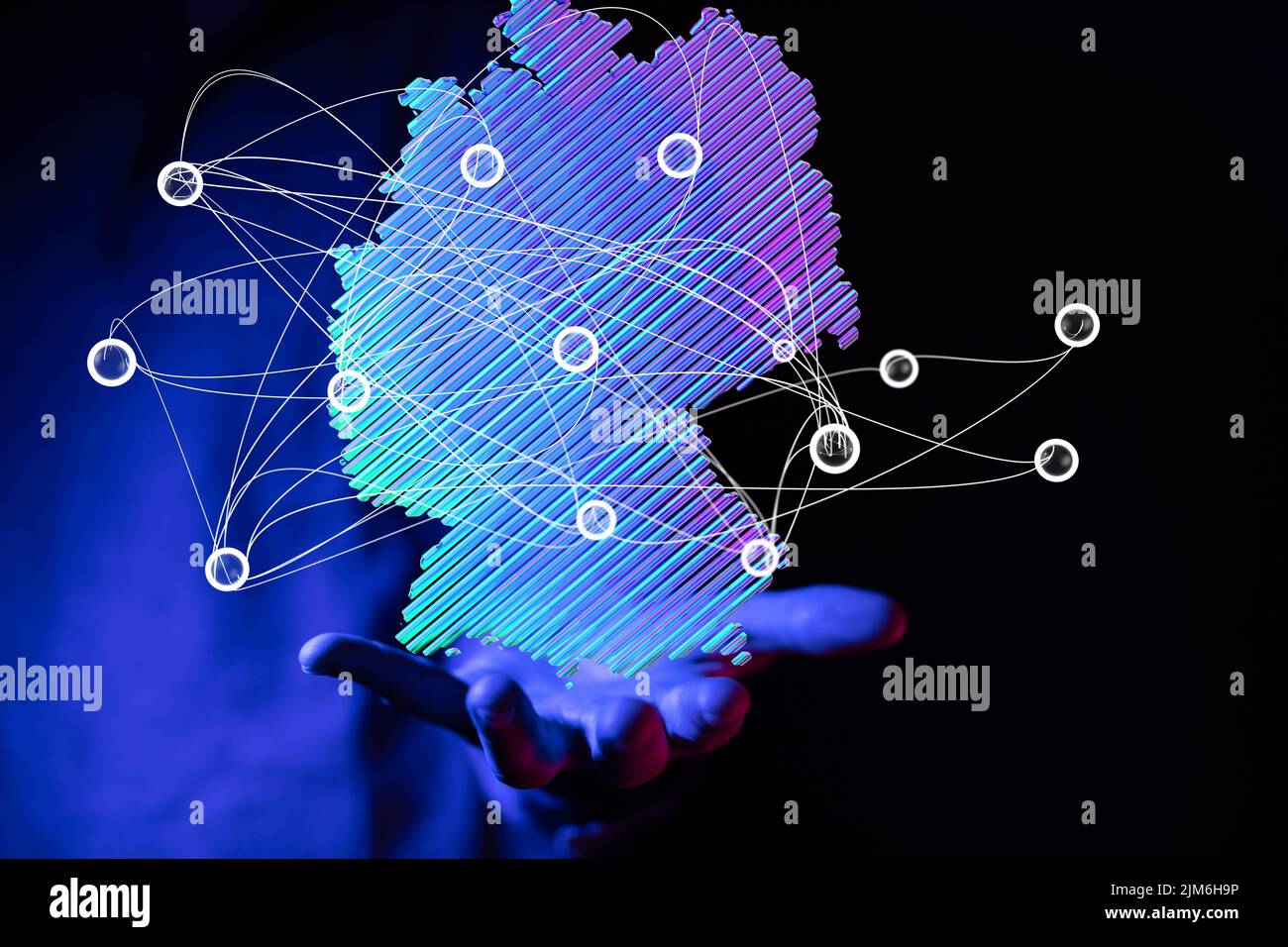A 3D render of the map of Germany being manipulated by a person in a ...