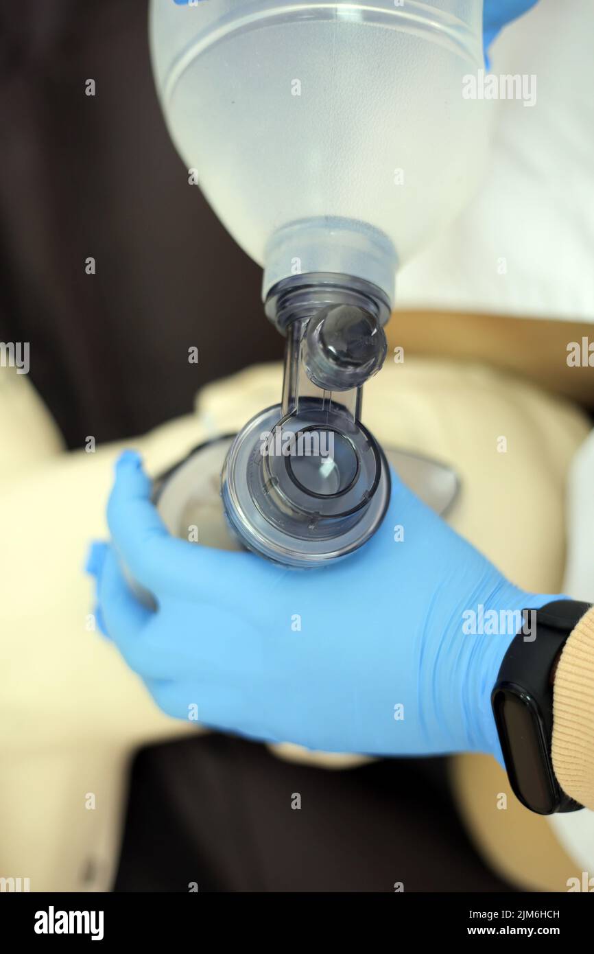 A medical student is learning how to perform temporary artificial ...