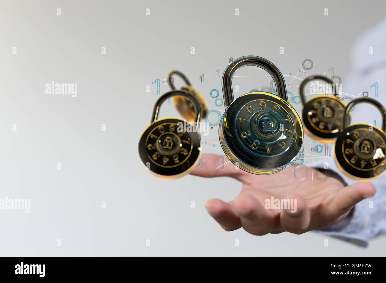 A businessman holding a floating render of digital padlocks- cybersecurity concept Stock Photo ...