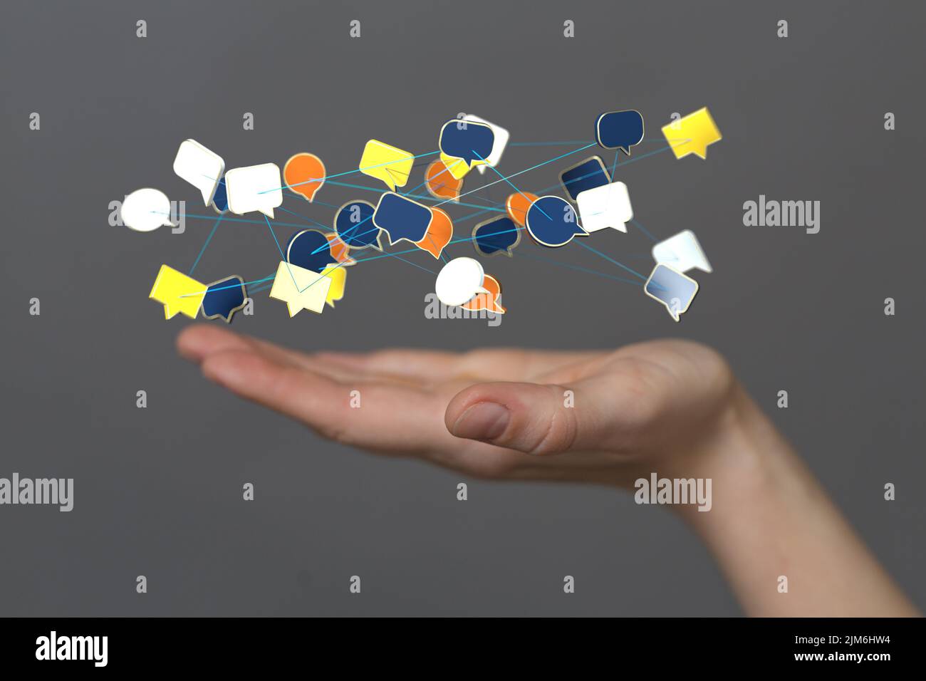 A businessman's hand holding a floating digital render of ...