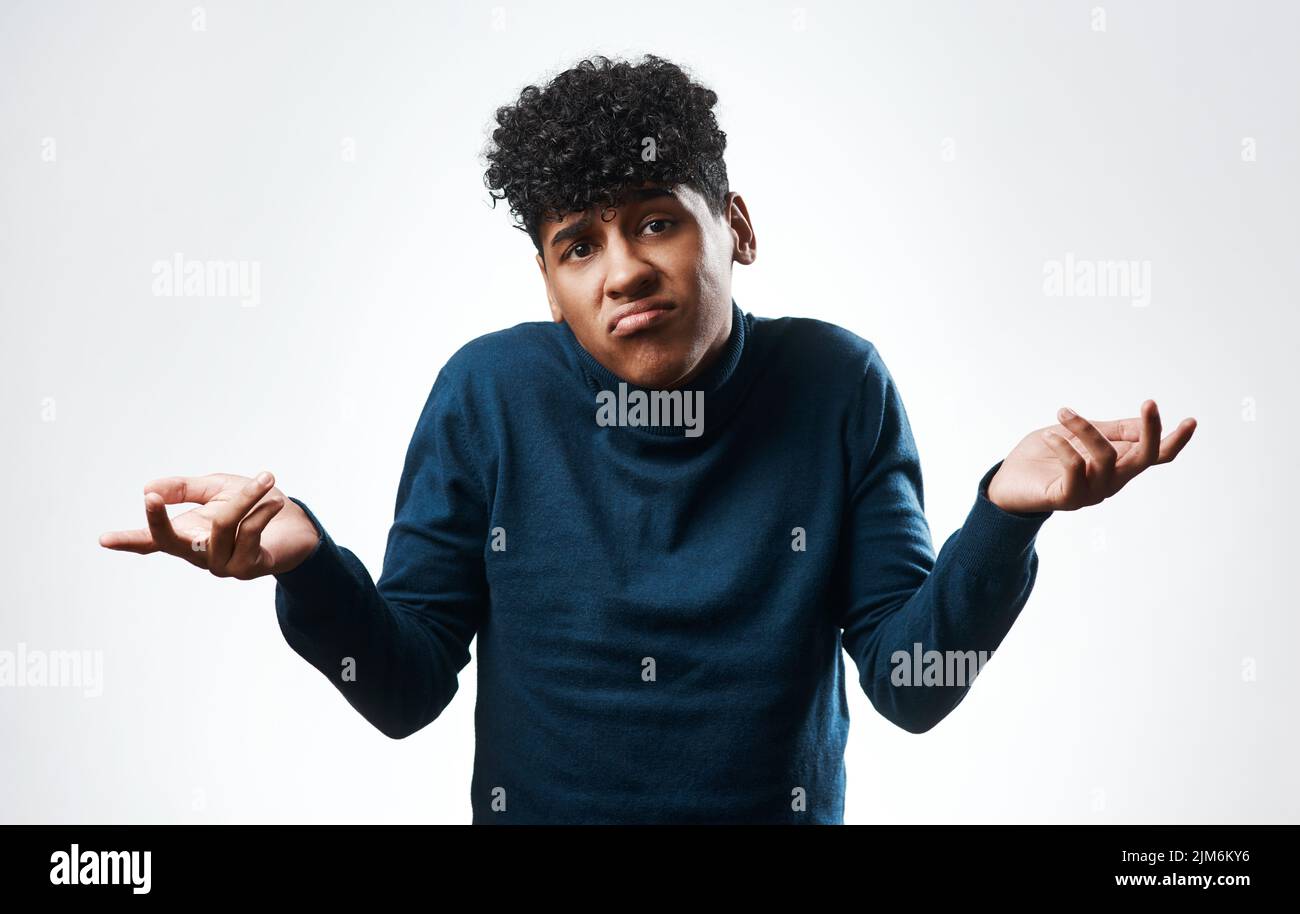 Shrugging pose hi-res stock photography and images - Alamy