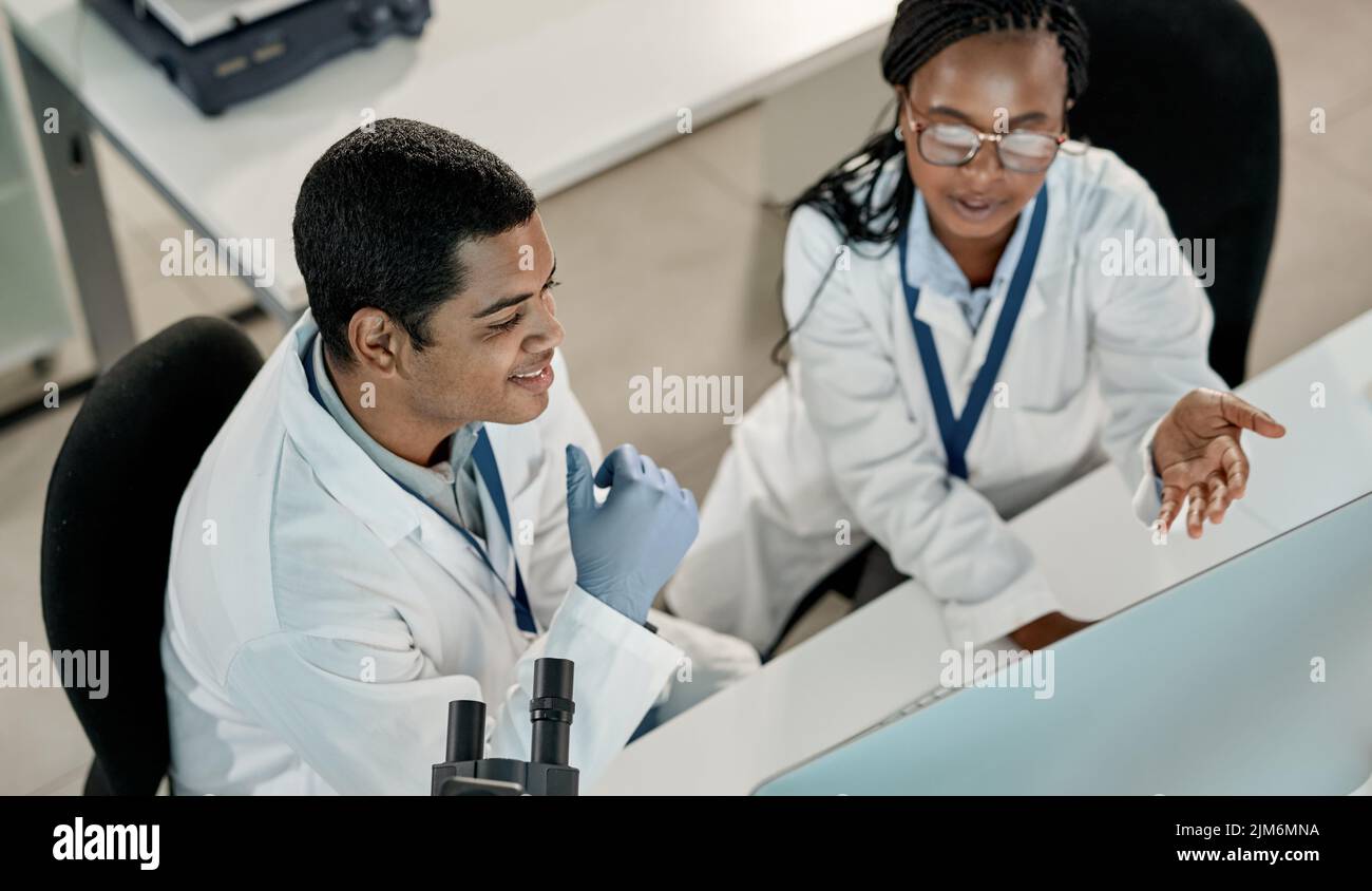 Scientists working inside modern laboratory hi-res stock photography ...