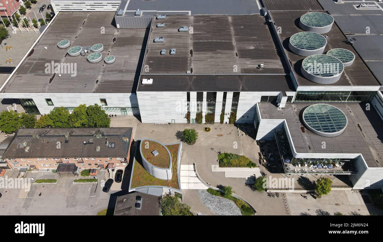 The bird's eye view of the roofs of the buildings with round glass ...