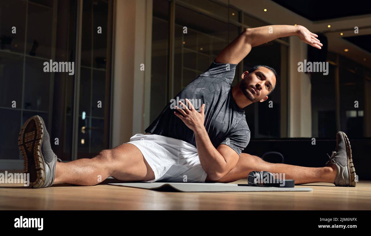 Preparation is key. Full length shot of a handsome young male athlete ...
