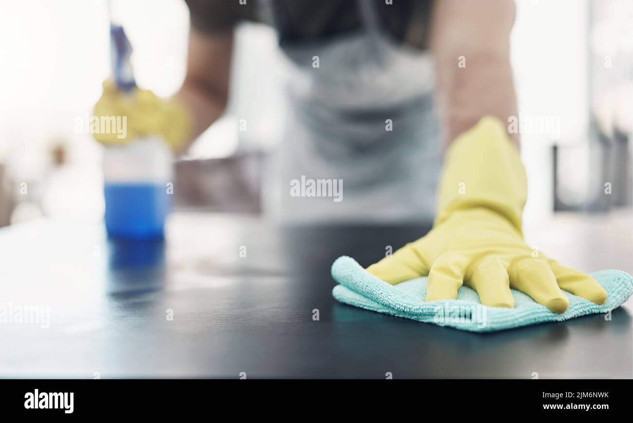 Keep it clean, keep it safe. an unrecognisable woman disinfecting a ...