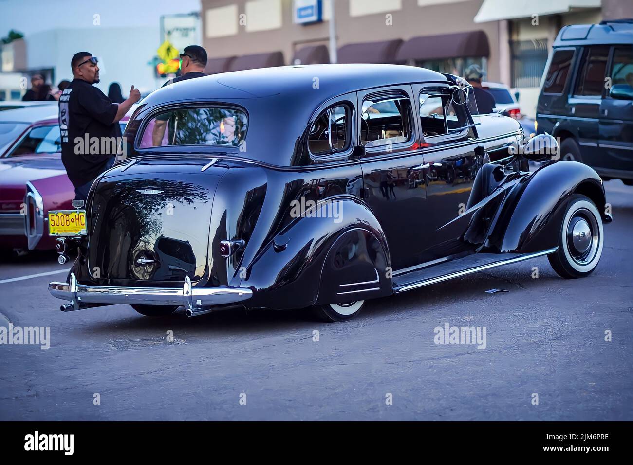 A back shot of a black Chevrolet Master Deluxe at the Sunday cruise in ...