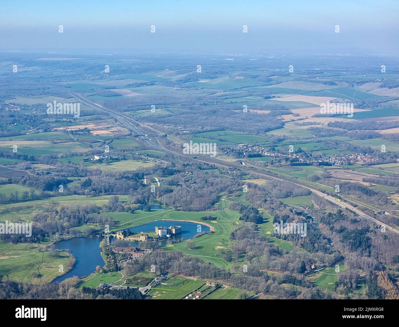 The Kent countryside taken from a helicopter, Leeds Castle and M20 is ...