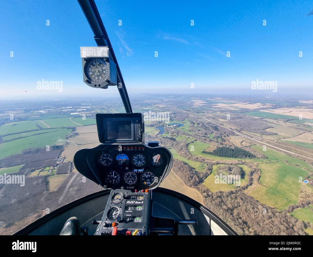 Aerial photo from cockpit of a Robinson R22 Helicopter Stock Photo - Alamy