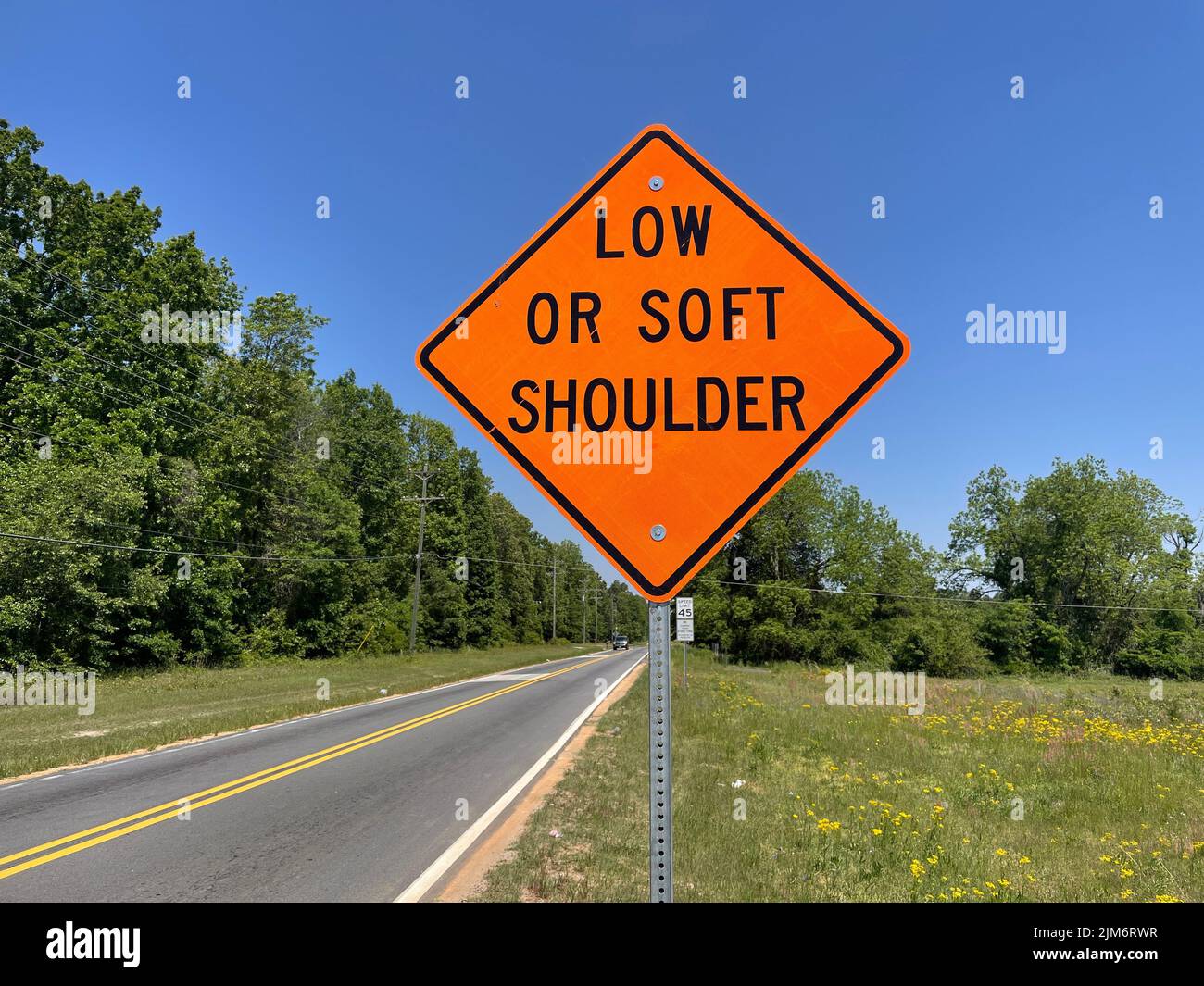 Soft shoulder road sign hi-res stock photography and images - Alamy
