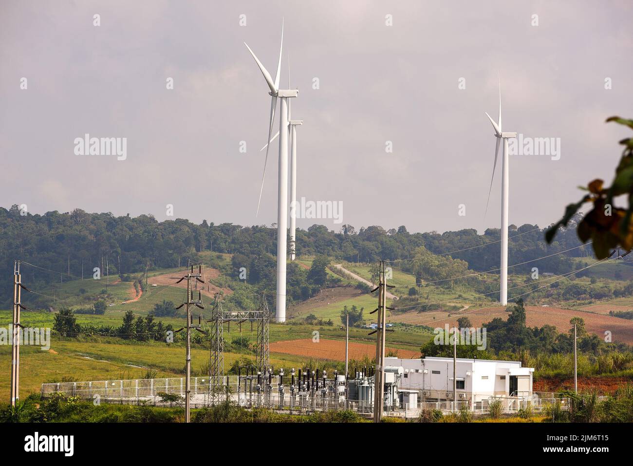 wind turbine farm on hill with power substation Stock Photo - Alamy